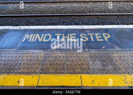 Mind The Step Sign on a British Railway Station Platform. Railway ...