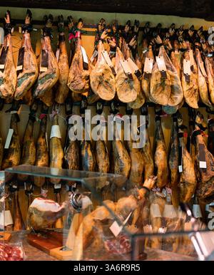 Legs of traditional Spanish jamon ready for sale Stock Photo - Alamy