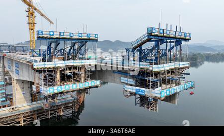 Workers are working at the construction site of Rongjiang Large Bridge ...