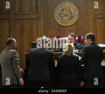 State District Judge Jason Cashon sits on the bench during the capital ...
