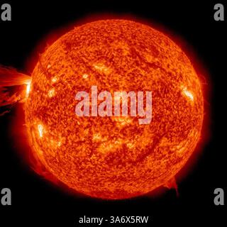 A massive coronal mass ejection (CME) erupts from the Sun, captured by ...