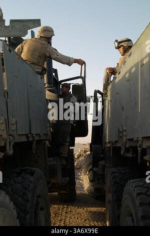 Jul 17, 2004; Fallujah, Iraq; To battle back Iraq's heat in the middle ...