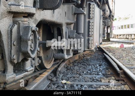Zoom train suspension of a Public Thai Train Railway Stock Photo - Alamy