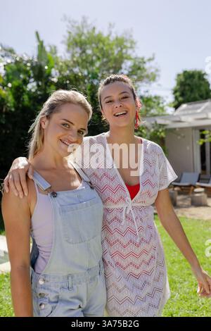 Two best female friends embracing together outdoors Stock Photo - Alamy