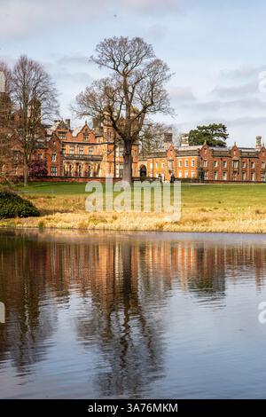 View accros the lake at Capesthorne Hall, a country house near the ...