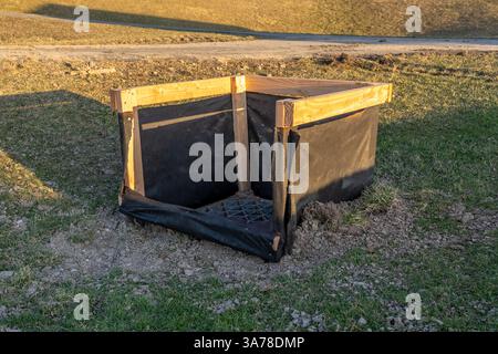 Photo of temporary silt fence, silt trap, around a storm inlet on a ...