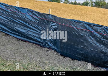 Silt Fence fabric with wire mesh and wooden posts installed prior to ...