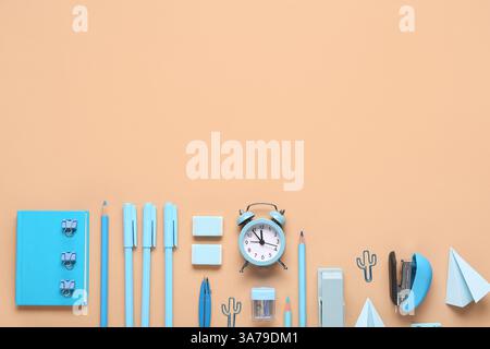 Blue paper planes on beige background Stock Photo - Alamy