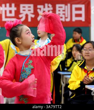 ZAOZHUANG, CHINA - MARCH 27, 2025 - Primary school students perform ...
