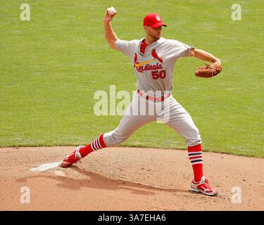 St. Louis Cardinals pitcher Adam Wainwright warms up during spring ...