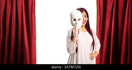 Red curtain with mask on white background Stock Photo - Alamy