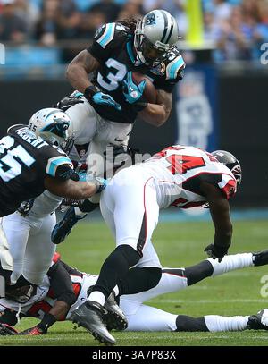 The Carolina Panthers DeAngelo Williams rushes against the Dallas ...
