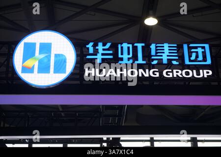 SHANGHAI, CHINA - MARCH 26, 2025 - Visitors visit NAura's stand at SEMICON China 2025 in ...