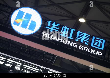 SHANGHAI, CHINA - MARCH 26, 2025 - Visitors visit ASML's lithography equipment at SEMICON China ...