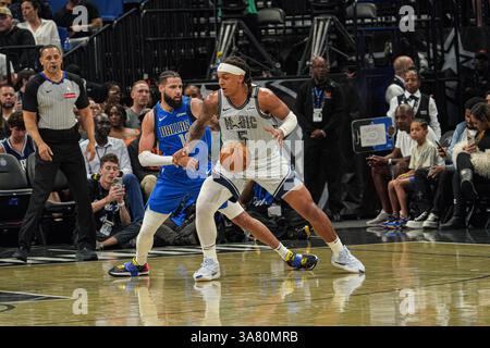 Dallas Mavericks forward Caleb Martin (16) dribbles during the first ...