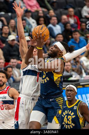 Washington Wizards guard Colby Jones (1) scores on Miami Heat forward ...