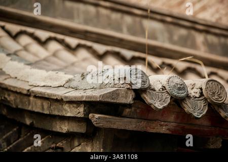 Traditional Roof Tiles with Decorative Elements Stock Photo - Alamy