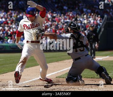Philadelphia Phillies' Chase Utley tries to catch a single hit by ...