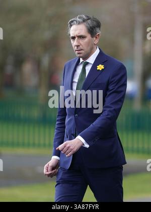 Tanaiste and Minister for Defence Simon Harris (right) and Defence ...