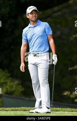 Xander Schauffele watches his tee shot on the 14th hole during a ...