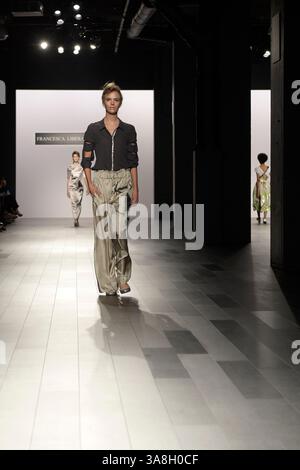 A model walks the runway at the Francesca Liberatore fashion show ...