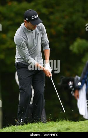 Patrick Cantlay chips to the green on the second hole during the first ...