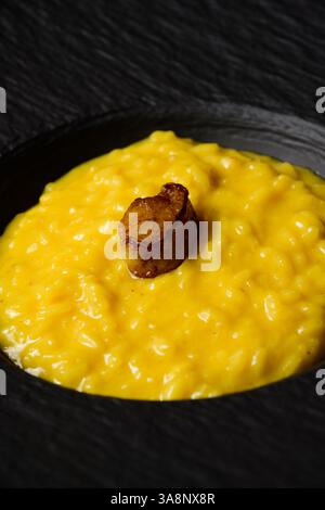 Italian saffron risotto alla milanese Stock Photo - Alamy