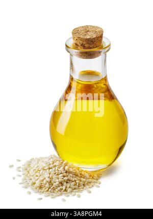 Healthy food concept. Sesame seeds set, in glass jar, on black stone ...