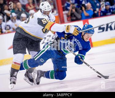 Vegas Golden Knights' Keegan Kolesar (55) and St. Louis Blues' Jimmy ...