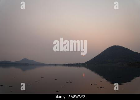 Sunset over Baranti Lake in Purulia district, West Bengal, India Stock ...