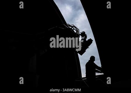 Turnov, Czech Republic. 29th Mar, 2025. A partial solar eclipse in the ...
