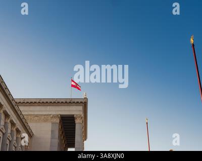 Flags of Austria on roof Parlament. Majestic Austrian Parliament ...