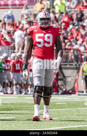 Ohio State offensive lineman Isaiah Kema stretches during an NCAA ...