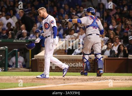 Chicago Cubs' Ian Happ reacts after a home run during a baseball game ...
