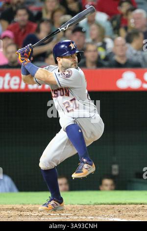 Houston Astros' Jose Altuve bats during the fifth inning of a baseball ...