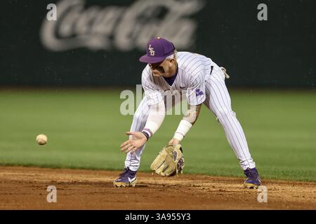 LSU infielder Daniel Dickinson (14) throws during an NCAA regional ...
