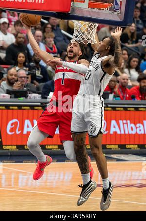 Washington Wizards guard Colby Jones (1) is fouled by Miami Heat ...