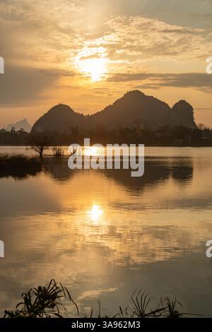 Celestial Dawn on Li River: Golden Mist Rising Between Emerald Karst ...