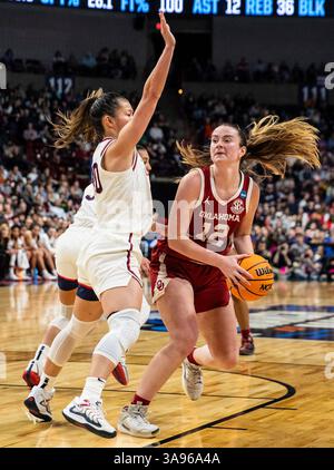 Oklahoma guard Payton Verhulst (12) drives past Iowa guard Kylie ...