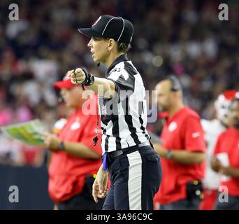 Line judge Sarah Thomas (53) signals a spot of the ball between the ...