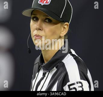 Line judge Sarah Thomas (53) signals a spot of the ball between the ...