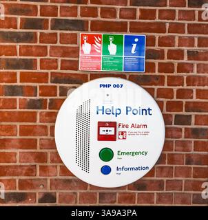 Help Point mounted on a brick wall with emergency and information call ...