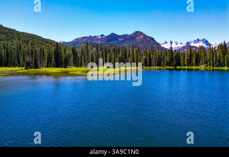 Scenic nature of popular hiking Cooper lake. Cooper lake with mountain ...