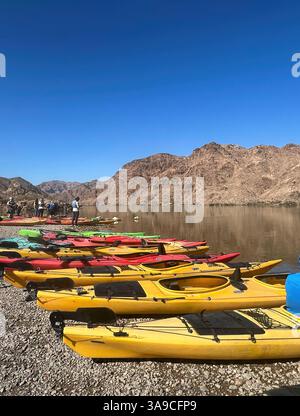 rocks on the beach next to a creek Stock Photo - Alamy