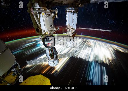 Long exposure of Planet Earth and the ISS. Digital enhancement of an ...