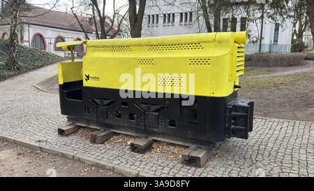 Old yellow diesel locomotive. Underground coal mine transport rail ...