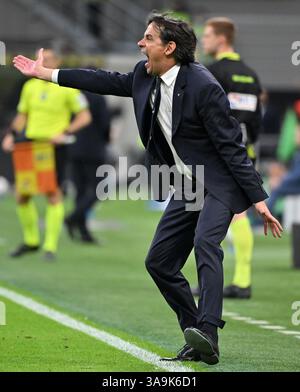 Inter Milan's head coach Simone Inzaghi watches players during a ...