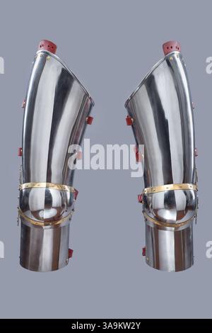 Medieval knight legs in metal armor, back view Stock Photo - Alamy