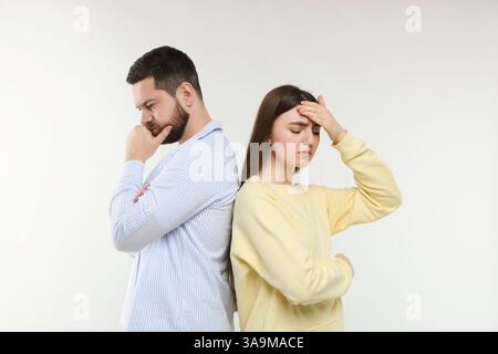 Resentful couple on light grey background. Relationship problem Stock ...
