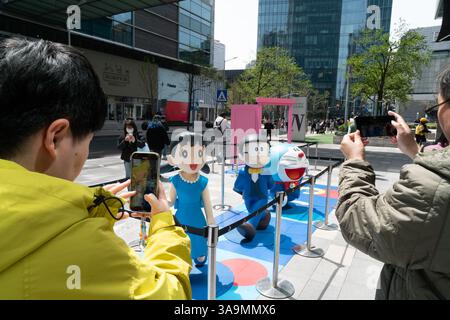 People visit a Doraemon exhibition in Shanghai, China, 31 March, 2025 ...